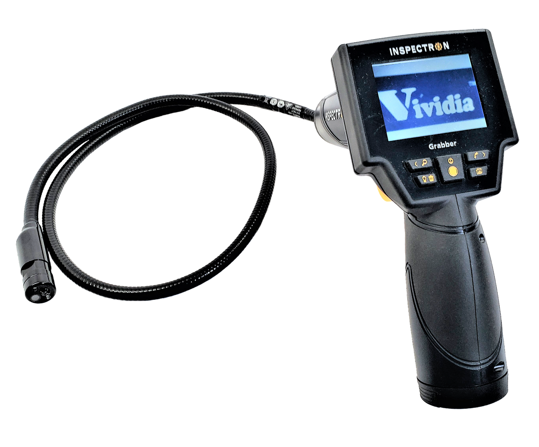 A pickup tool with a built-in inspection camera. Grabber borescope ...